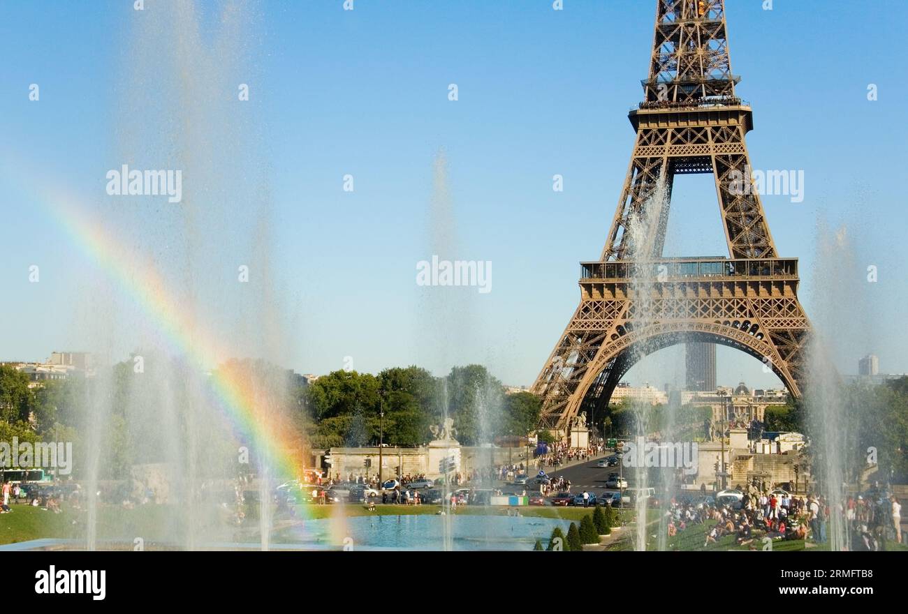 Summer in Paris. Eiffel Tower and rainbow in fountain Stock Photo - Alamy