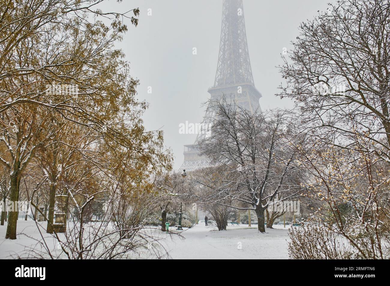 Scenic view to the Eiffel tower on a day with heavy snow. Unusual ...