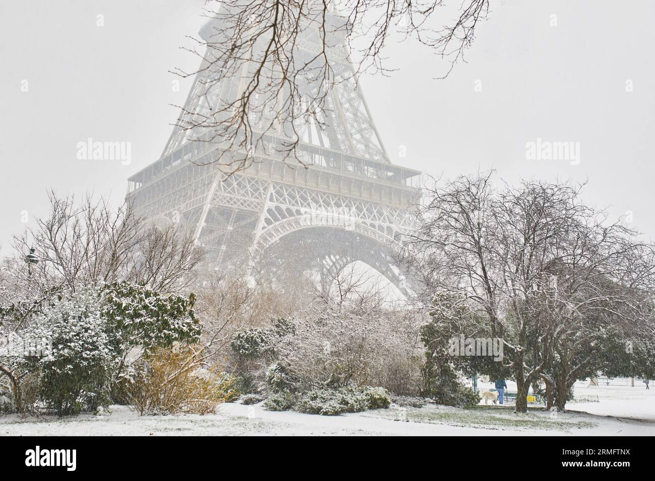 Scenic view to the Eiffel tower on a day with heavy snow. Unusual ...