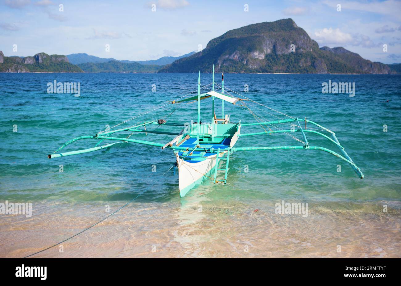 Outrigger boat near the shore on Palawan, Philippines Stock Photo - Alamy