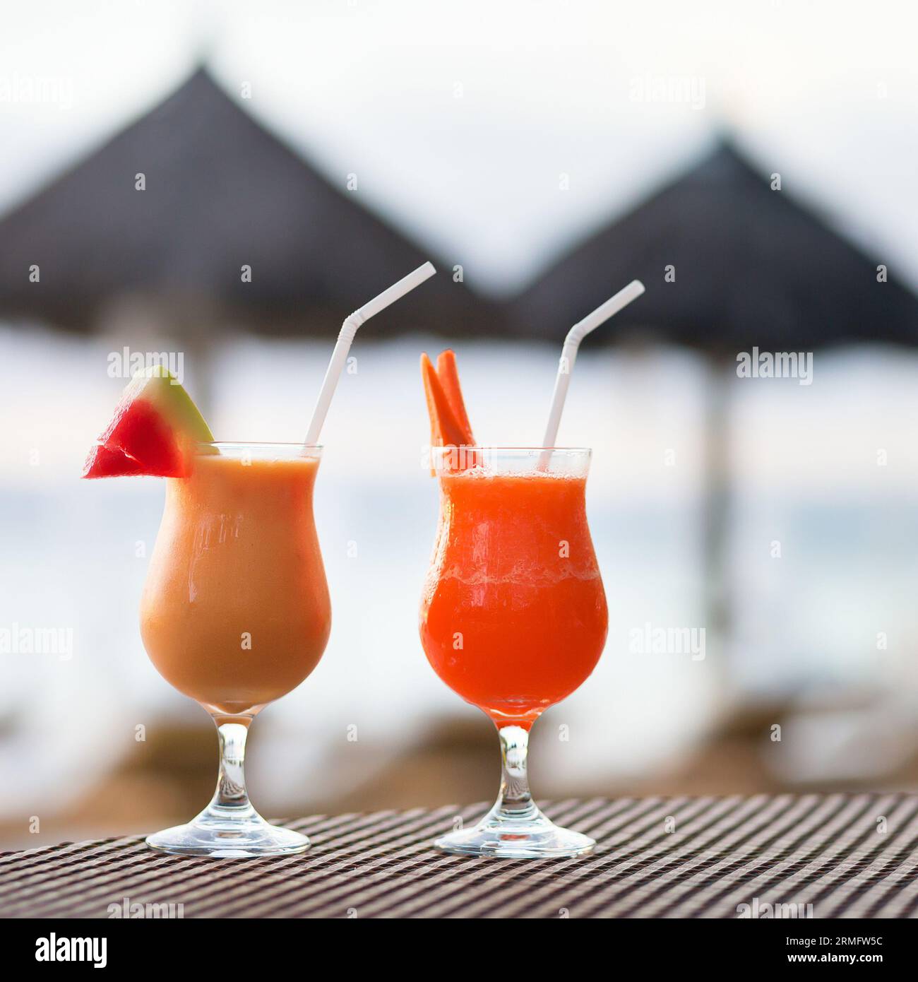 Two fresh juices on a tropical beach Stock Photo - Alamy