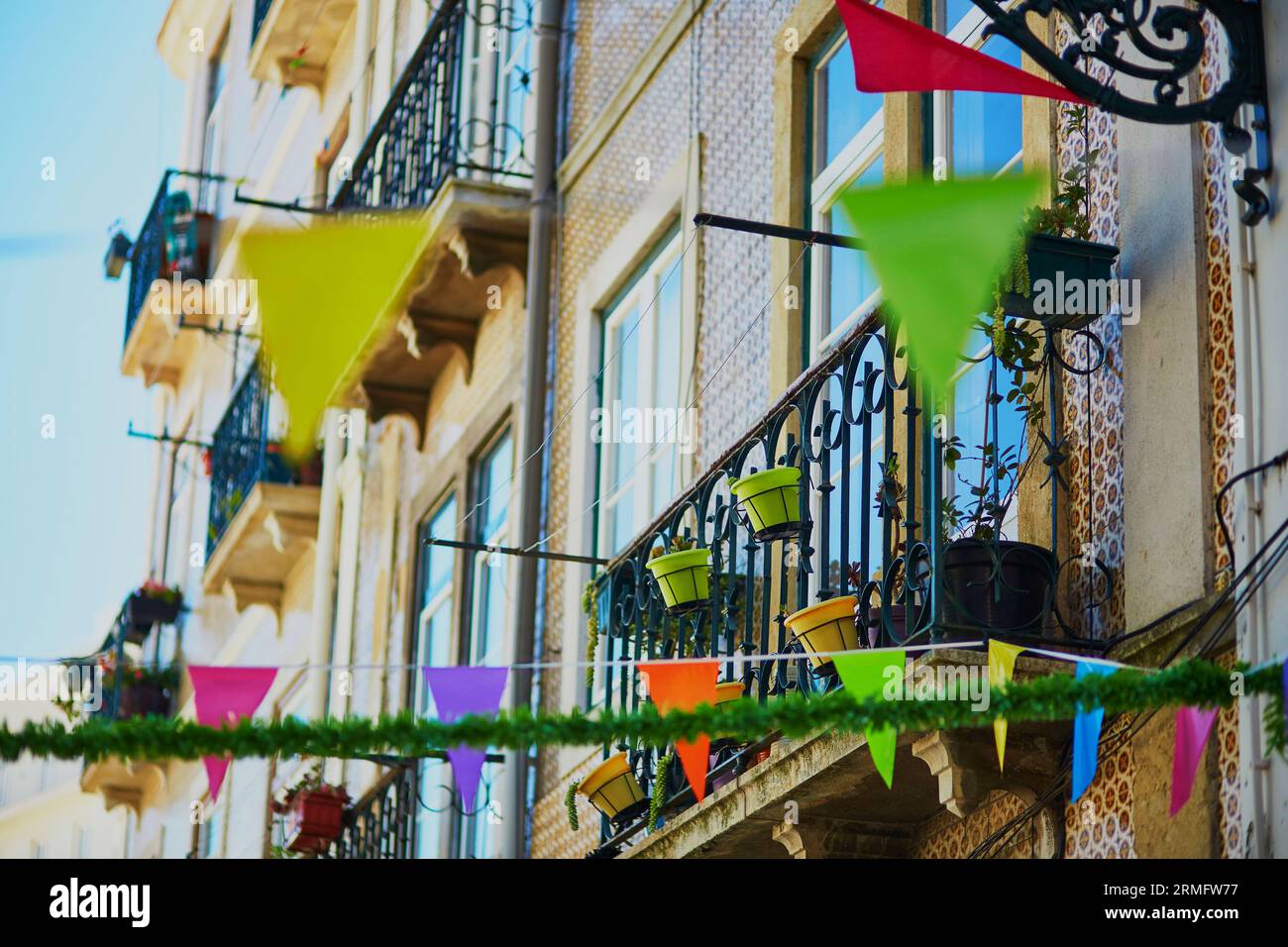 Typical street in Lisbon, Portugal with its colorful buildings ...