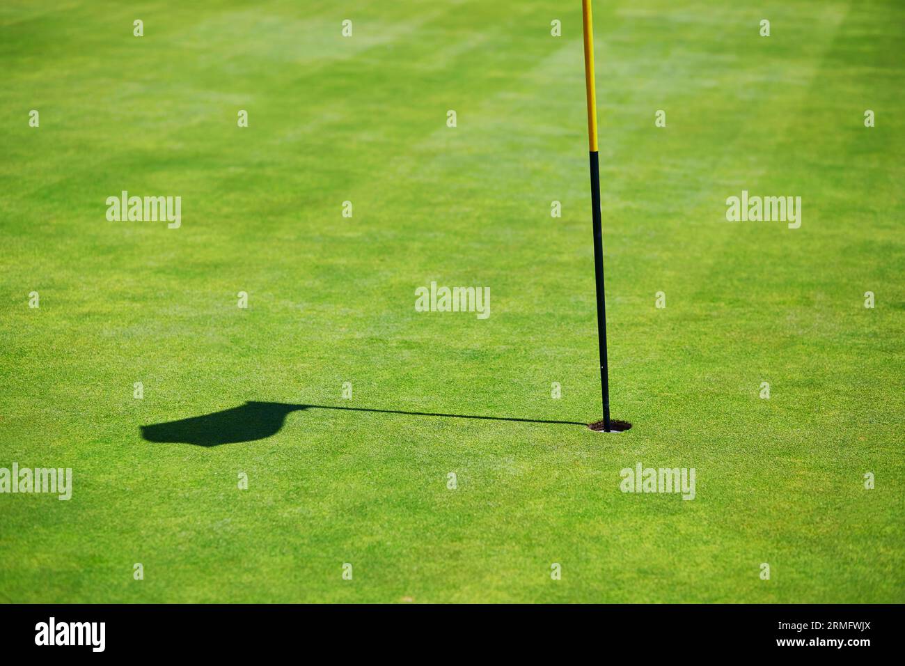 Shadow of golf flag hi-res stock photography and images - Alamy