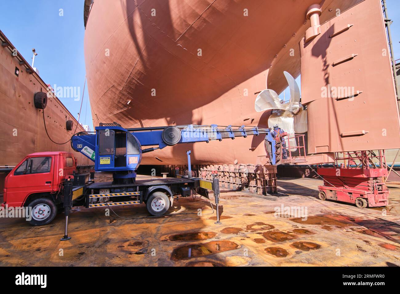 Aerial view of a shipyard repairing cargo ships. shipyard and ...