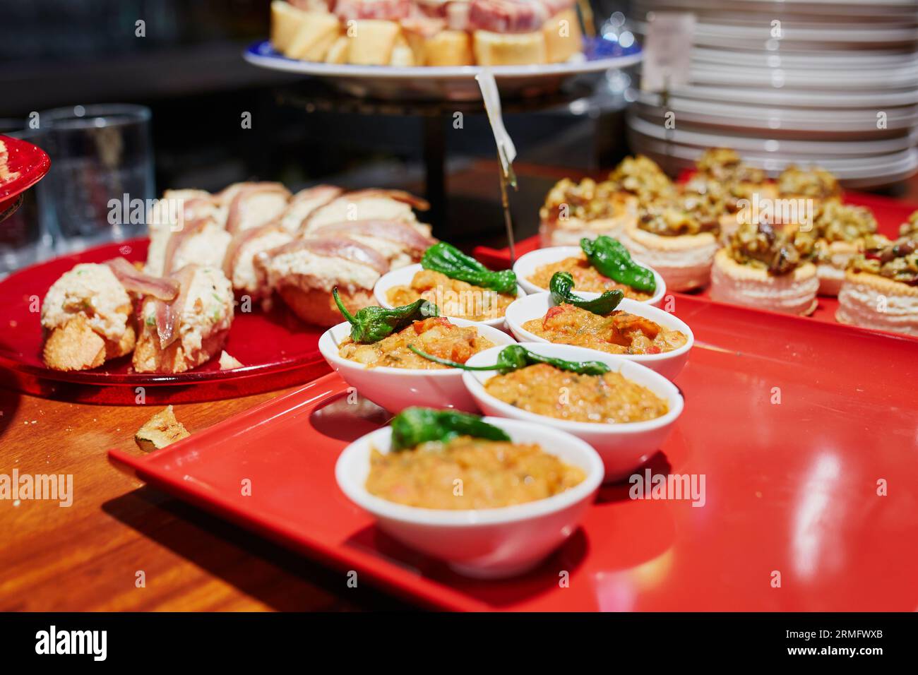 Variety of pinchos (pintxos) in a bar of San Sebastian (Donostia ...