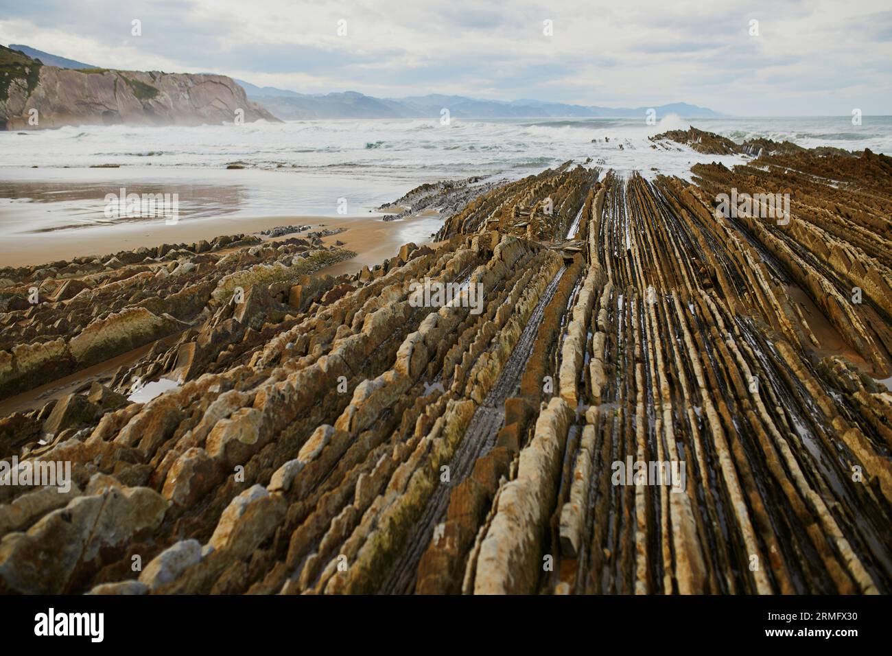 Famous flysch of Zumaia, Basque Country, Spain. Flysch is a sequence of ...