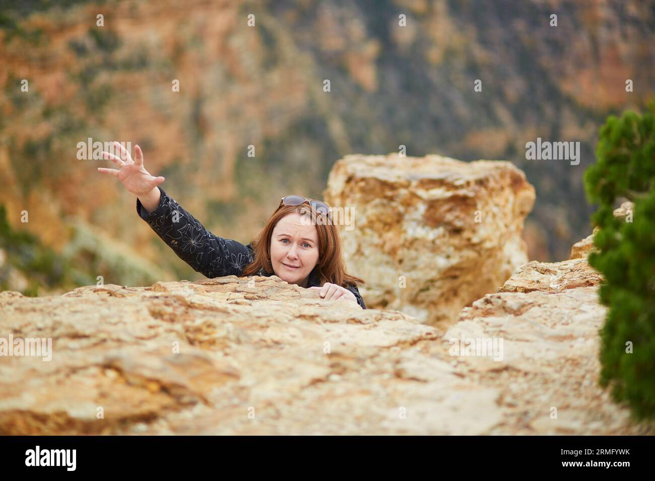 Tourist in Grand Canyon National Park, USA, posing for funny picture ...