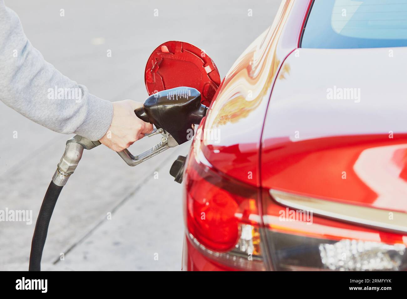 Pumping gasoline fuel in car hi-res stock photography and images - Alamy
