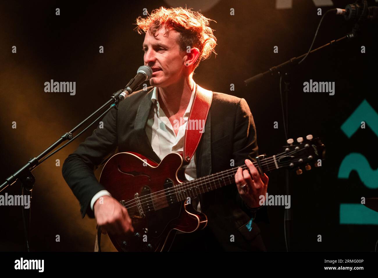 Buck Meek, guitarist with Big Thief, playing solo in heavy rain at ...