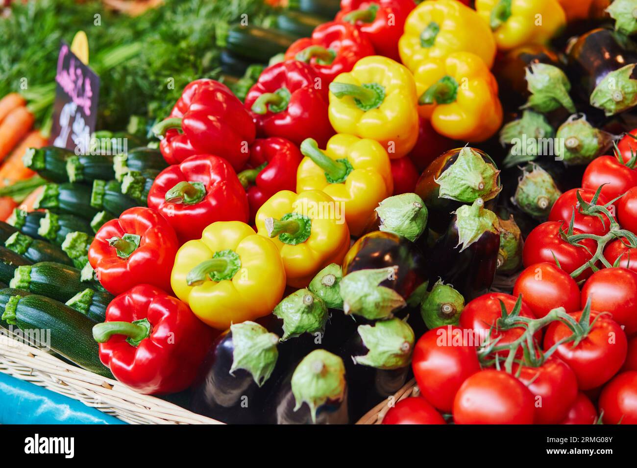 Fresh organic vegetables and fruits on farmer market in Paris, France. Typical European market ...