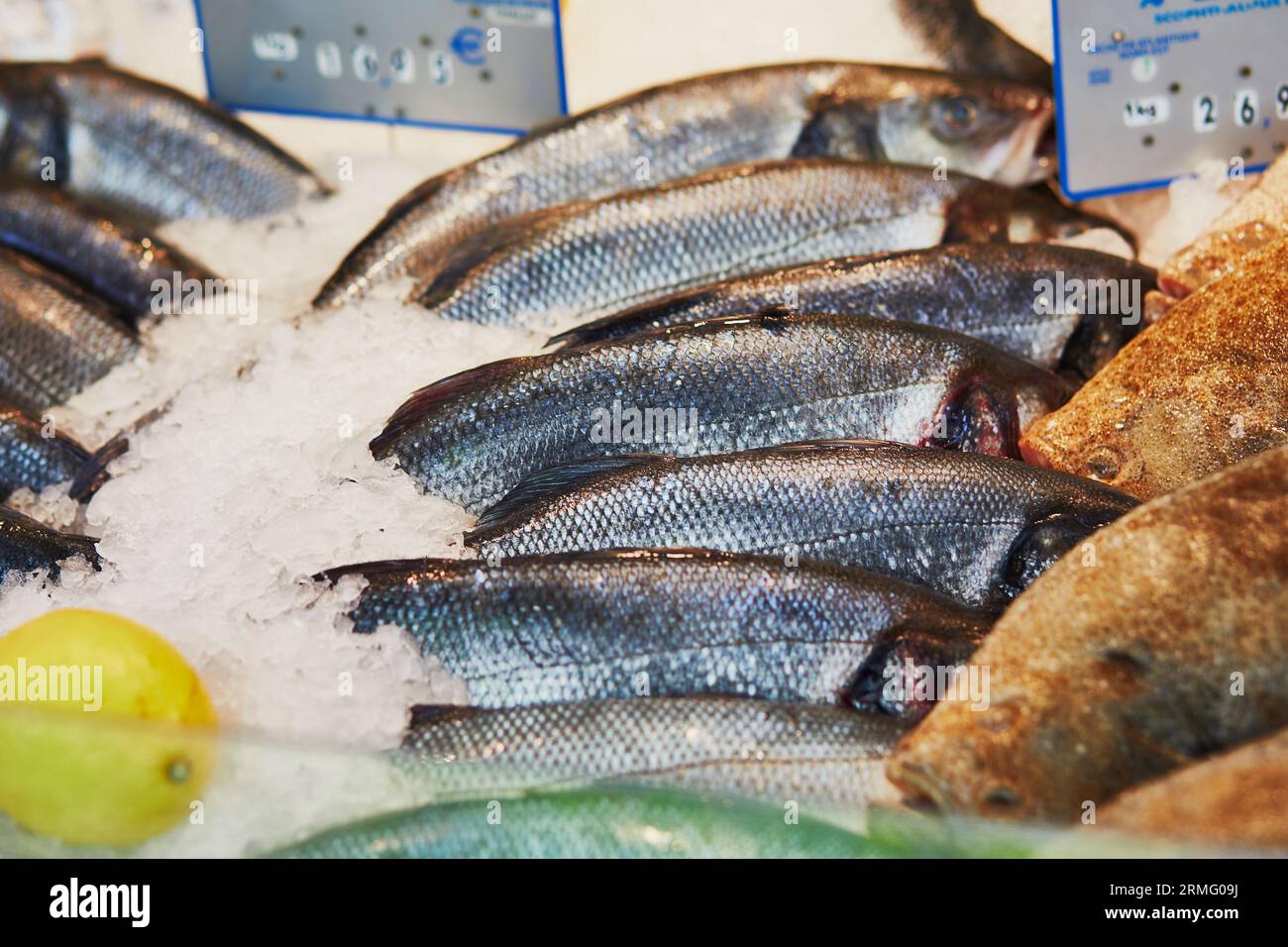 Fresh fish on farmer market in Paris, France. Typical European fish ...