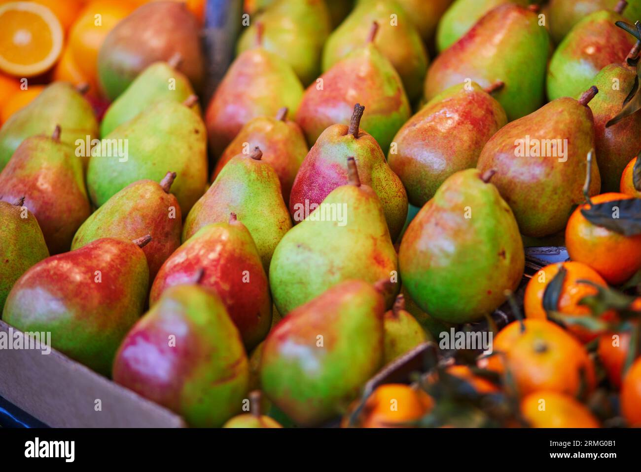 Large heap of fresh ripe organic pears on farmer market in Paris ...