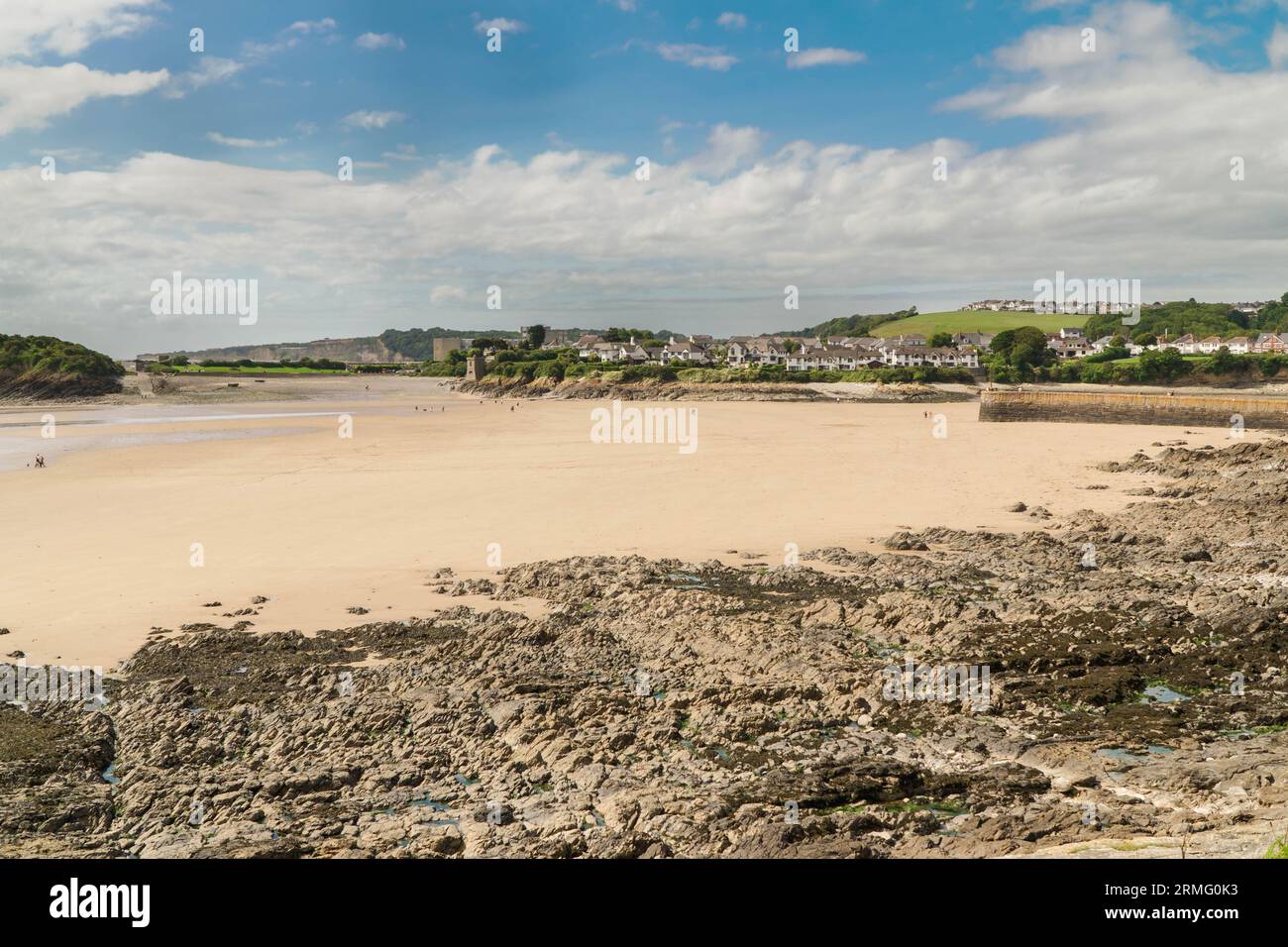 Harbour wall and view across to Watch House Bay, Barry Island Wales UK ...