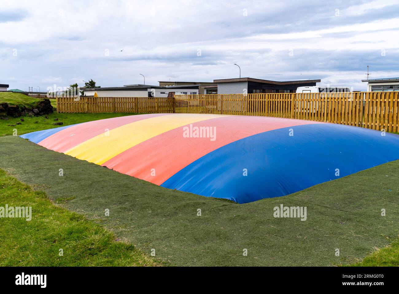 Colorful jumping balloon trampoline at a playground park in Iceland ...