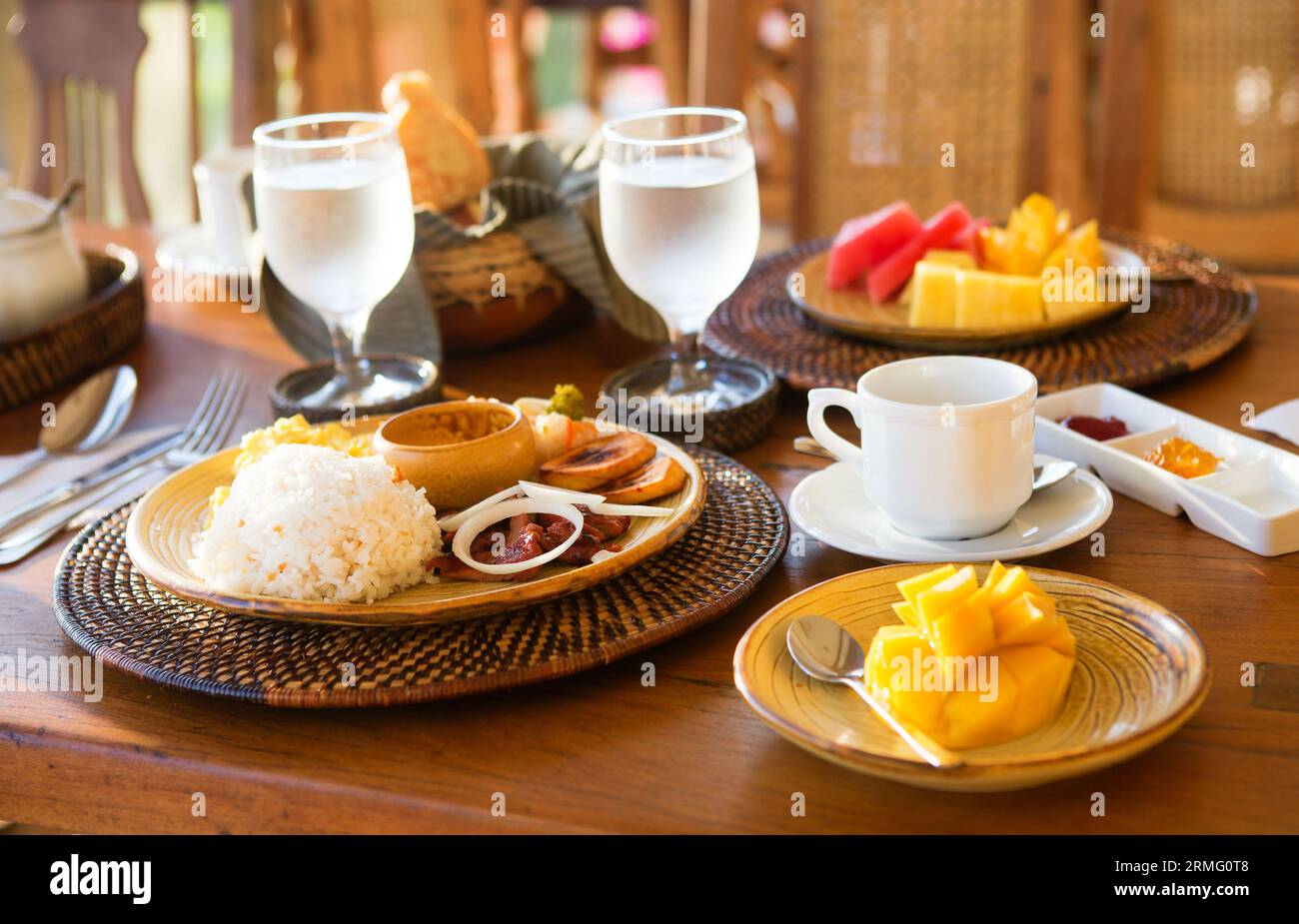 Traditional Philippino breakfast with garlic rice and adobo Stock Photo ...