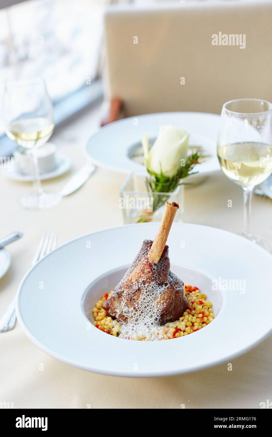 Delicious lamb chop on bone with foam sauce Stock Photo - Alamy