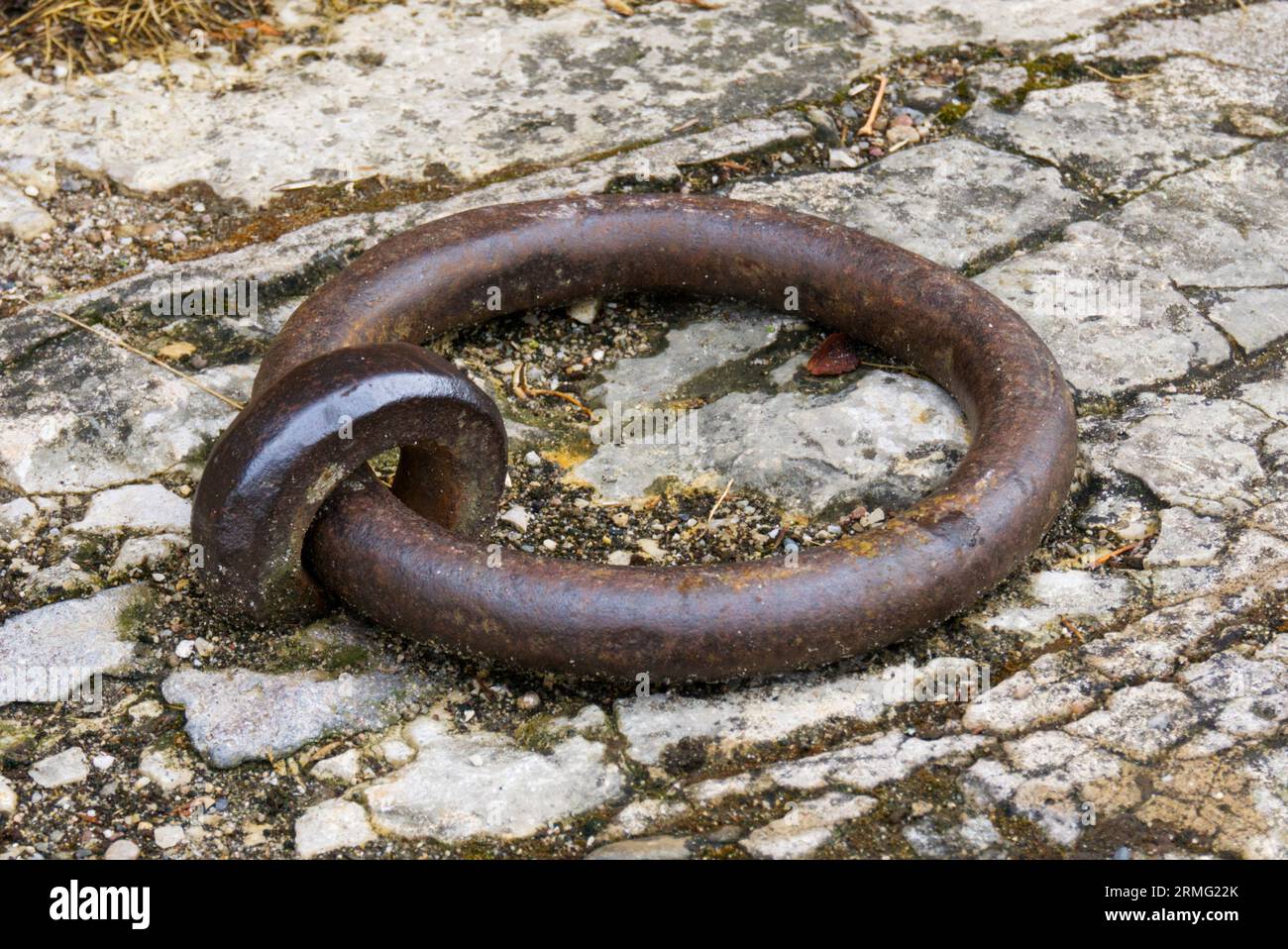 A rusty iron ring, attached to the floor Stock Photo - Alamy