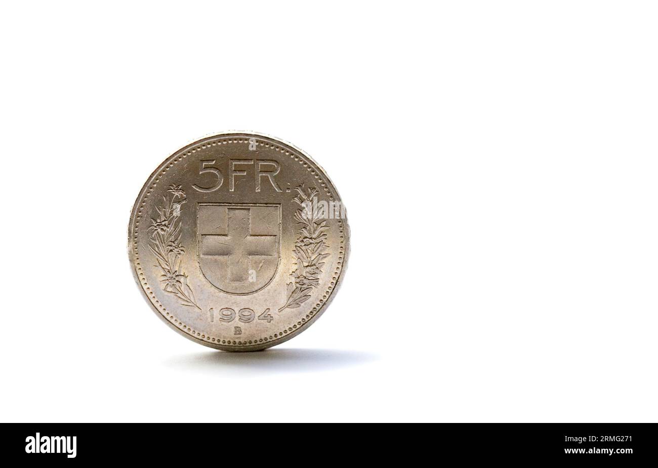 Single five Swiss franc coin isolated on white background Stock Photo ...