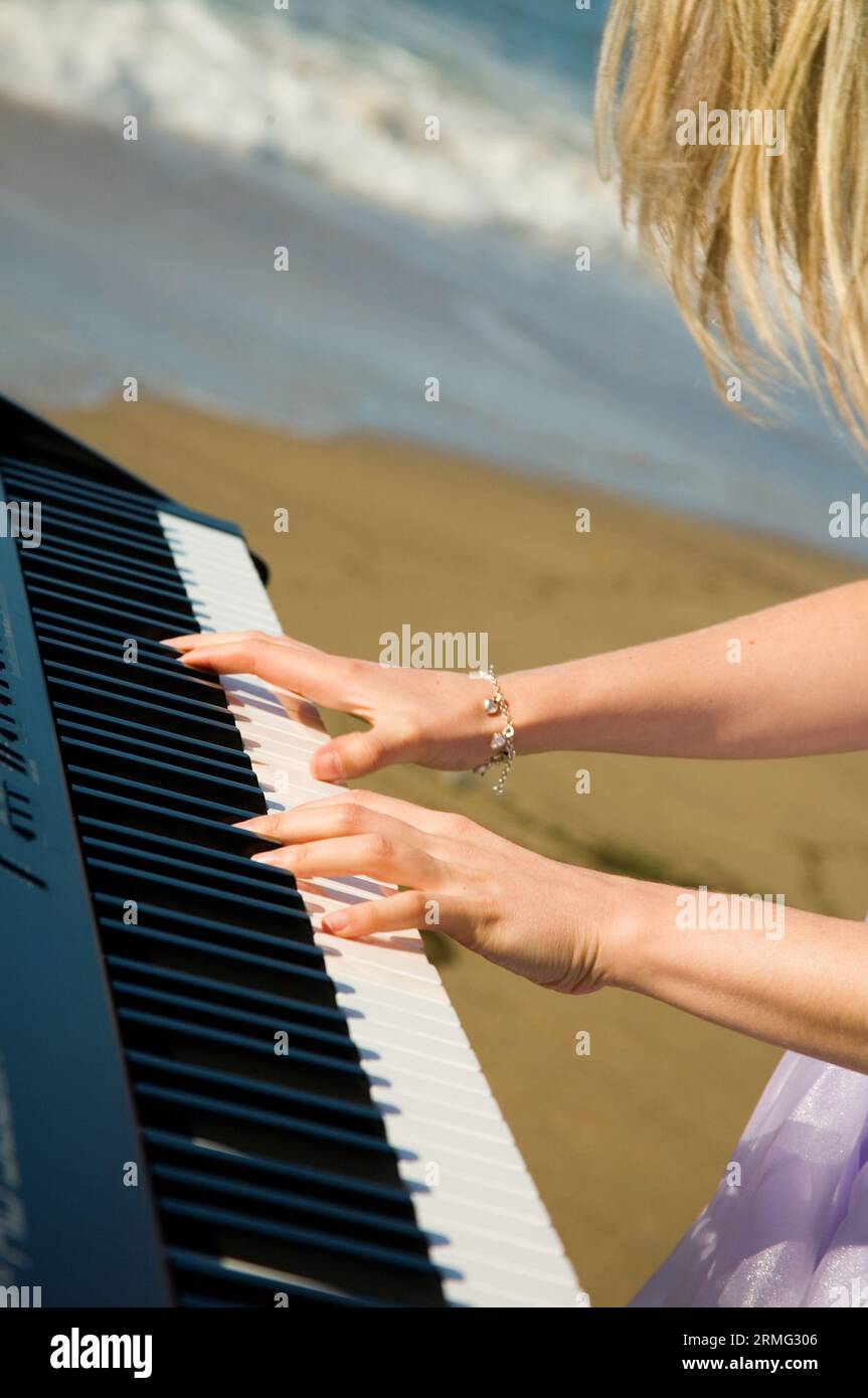 Female keyboard player performing hi-res stock photography and images ...