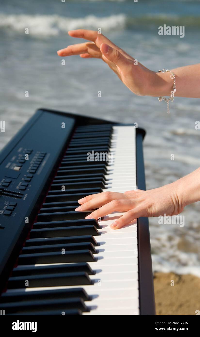 Female keyboard player performing hi-res stock photography and images ...