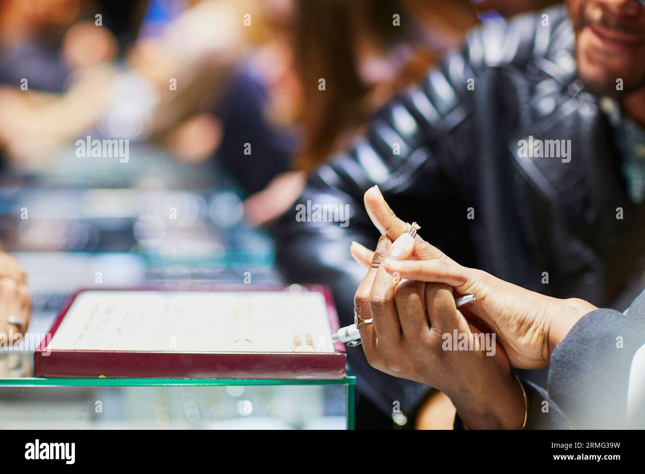 Hand selecting jewellery hi-res stock photography and images - Alamy