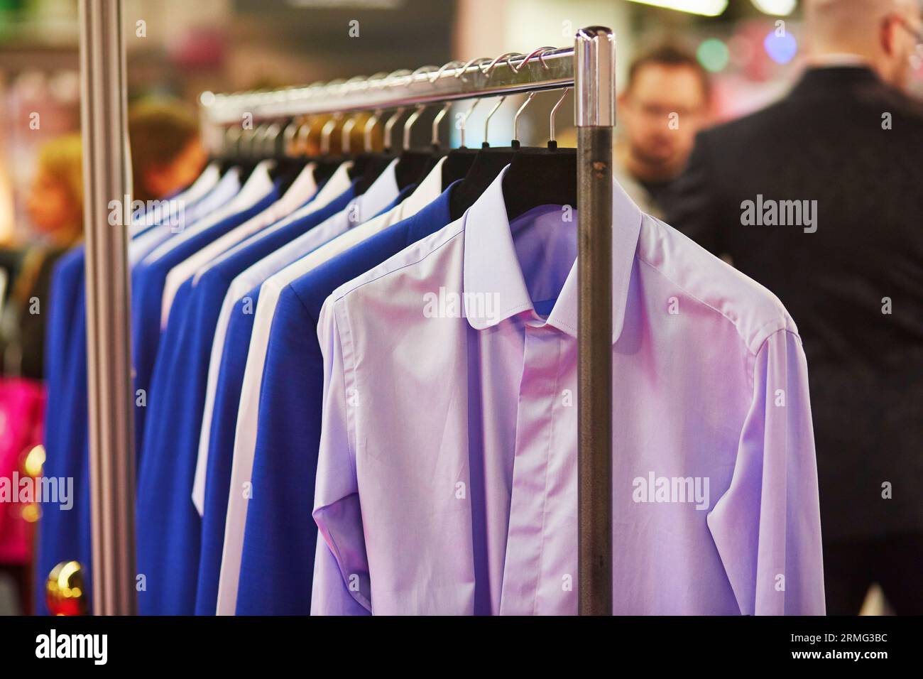 Selection of man's shirts in a shop Stock Photo - Alamy