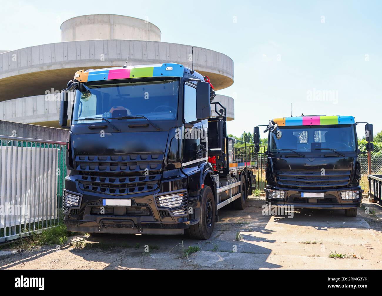 two trucks staying in the truck parking Stock Photo - Alamy