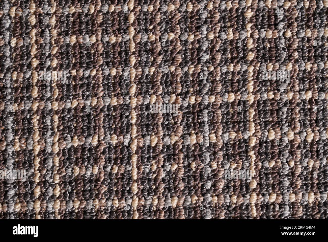 Textured background surface of brown textile carpet, decorated with ...