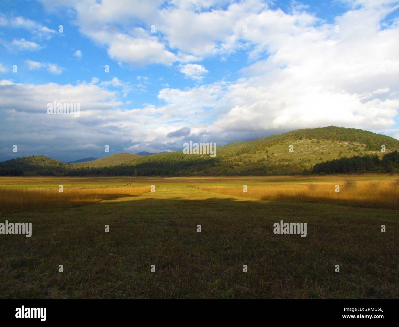 Colorful intermittent karst Petelinje lake near Pivka and Slovenska vas ...