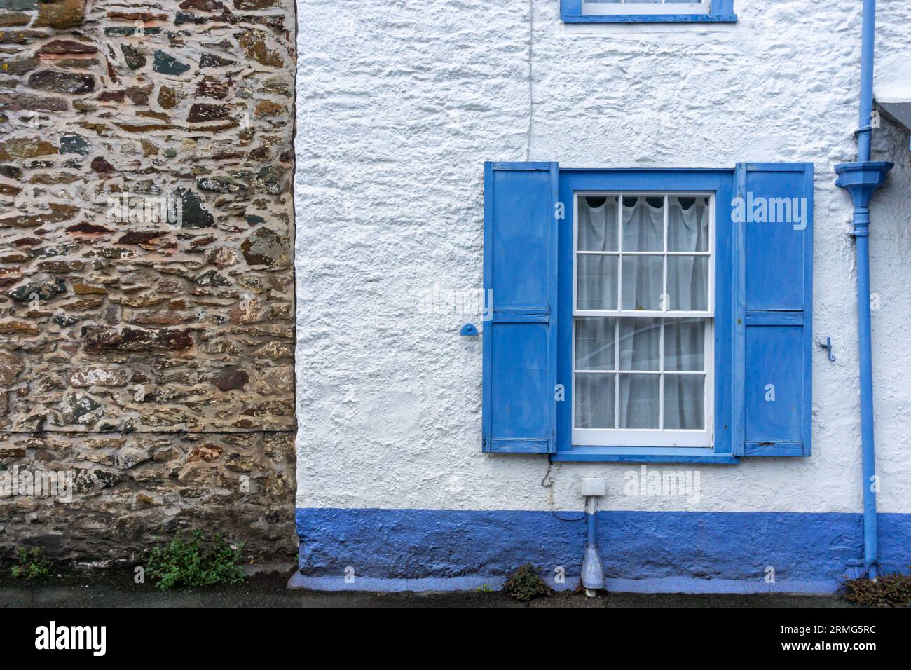 White-washed wall and blue shuttered window Stock Photo - Alamy