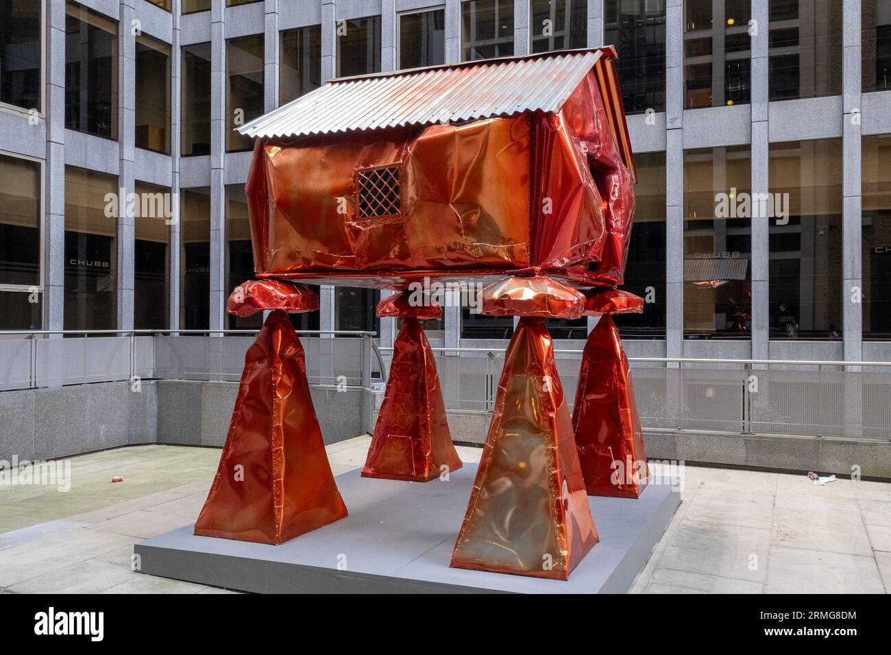 The sculpture of a bright red replica of an old grain store in London ...