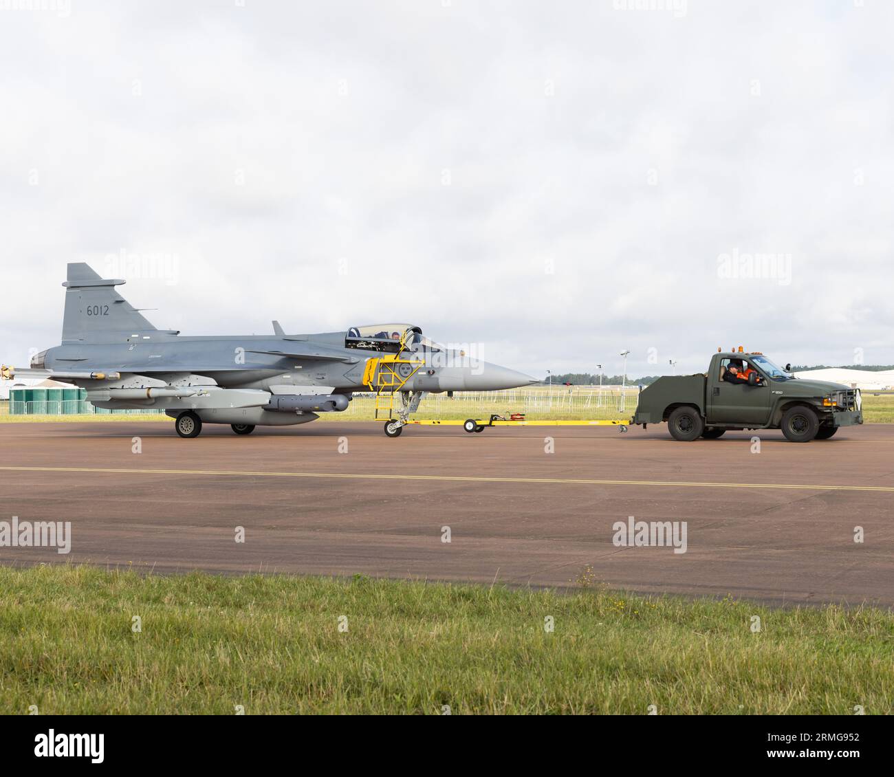 A Swedish SAAB JAS 39 Gripen jet fighter being towed at the 2023 Royal ...