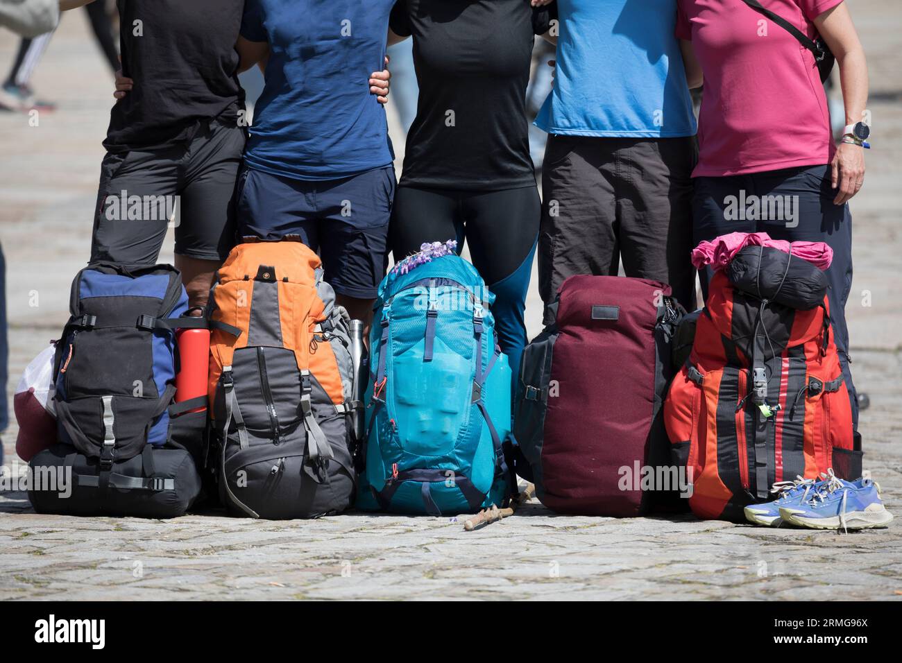 Pilgrims on the Camino de Santiago arrive at the Plaza del Obradoiro ...