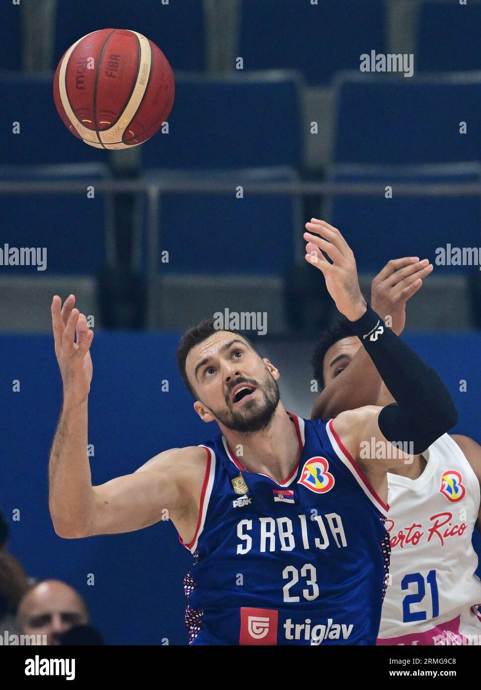 Quezon City, Philippines. 28th Aug, 2023. Marko Guduric (L) of Serbia ...