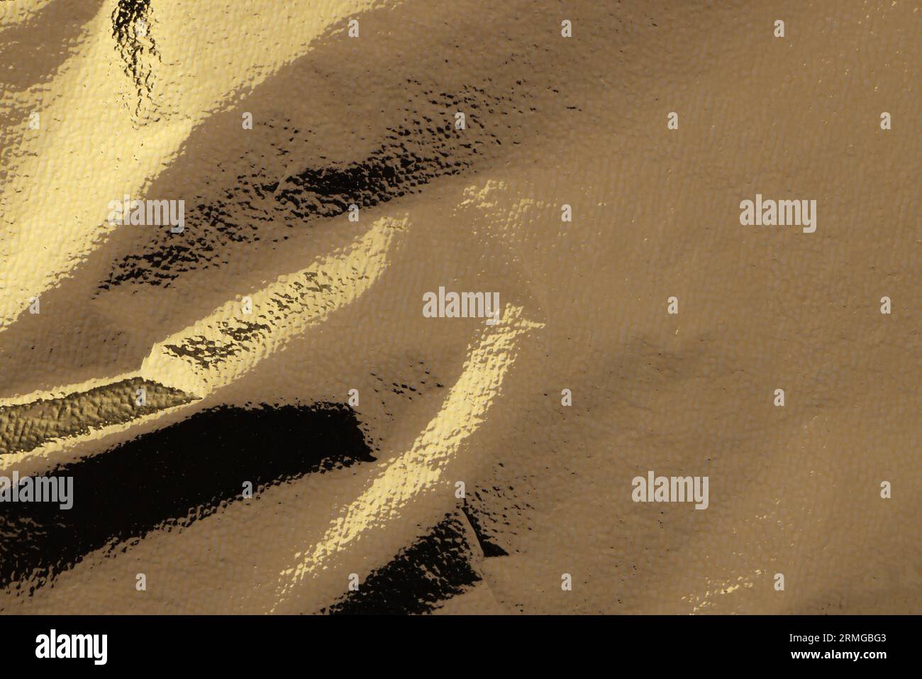 Edible gold leaf sheet as background, closeup Stock Photo - Alamy