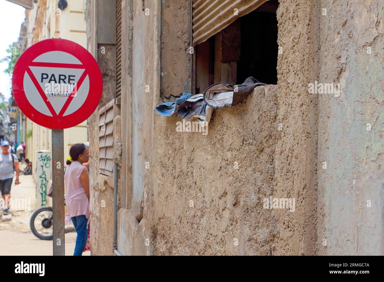 Havana, Cuba, 2023, Stop sign and clothes drying in window Stock Photo ...