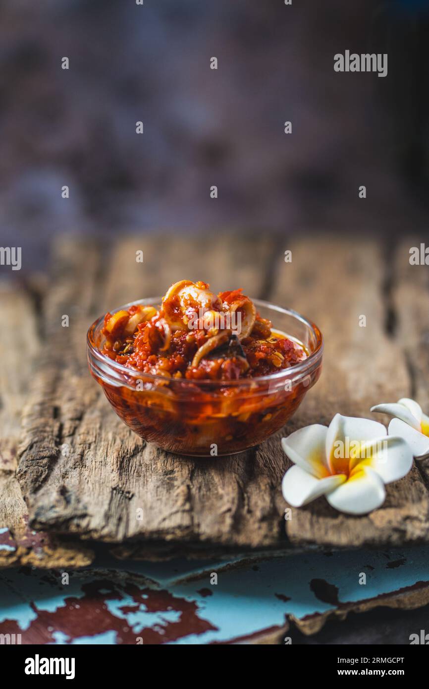 Sambal cumi or Indonesian spicy squid Stock Photo - Alamy