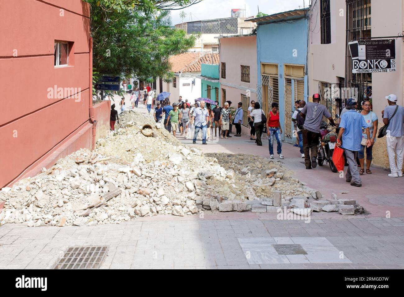 Havana, Cuba, 2023, People walking by rubble in the street Stock Photo ...