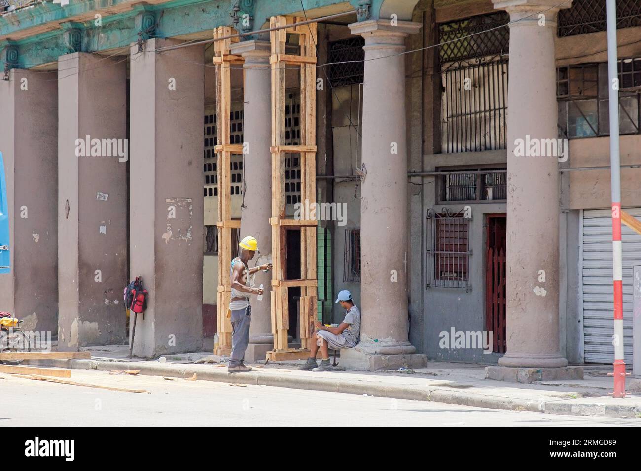 Havana, Cuba, 2023, Wood supporting scaffolding in collapsing porch ...