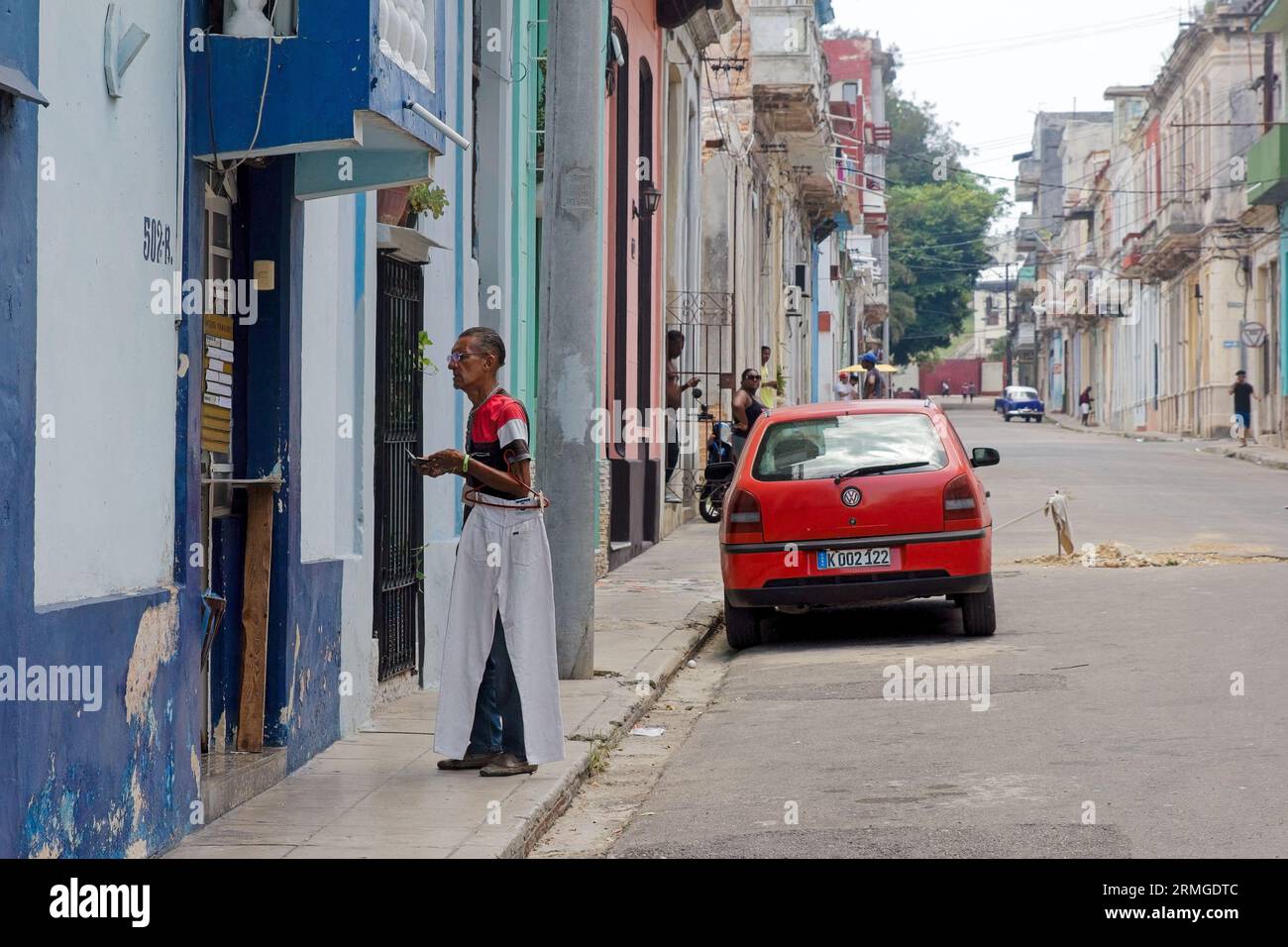 Havana, Cuba, 2023, Slim man person in the sidewalk Stock Photo - Alamy