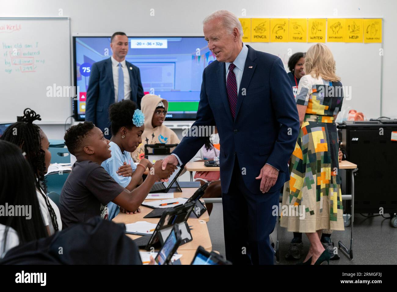 President Joe Biden and first lady Jill Biden greet students at Eliot ...