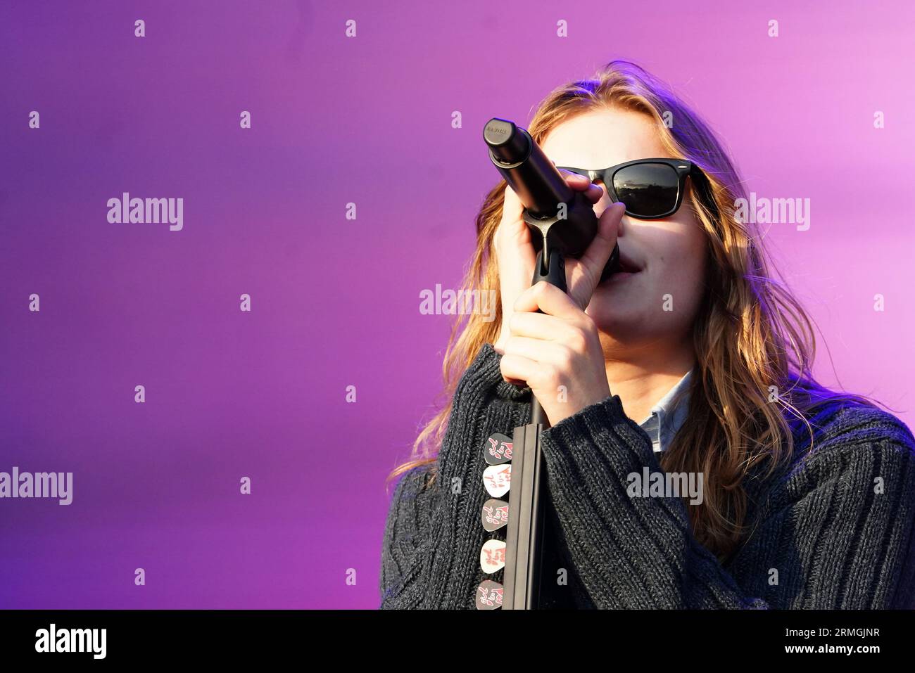 Girl in red performing hi-res stock photography and images - Alamy