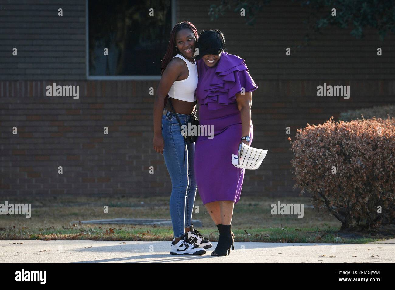 Principal Sabrina Cuby-King greets a student as she arrives for the ...