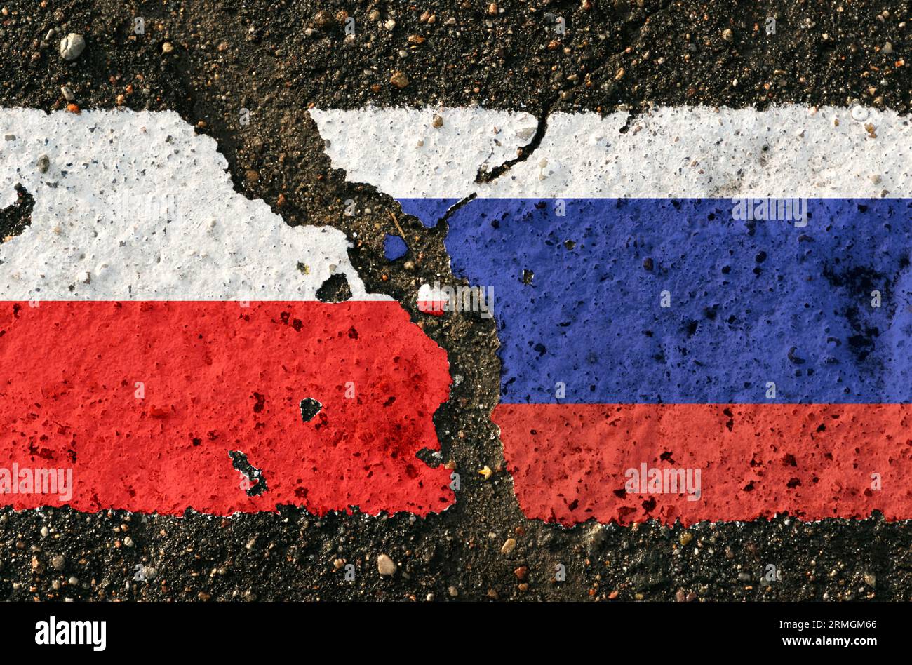On the pavement are images of the flags of Poland and Russia, as a ...