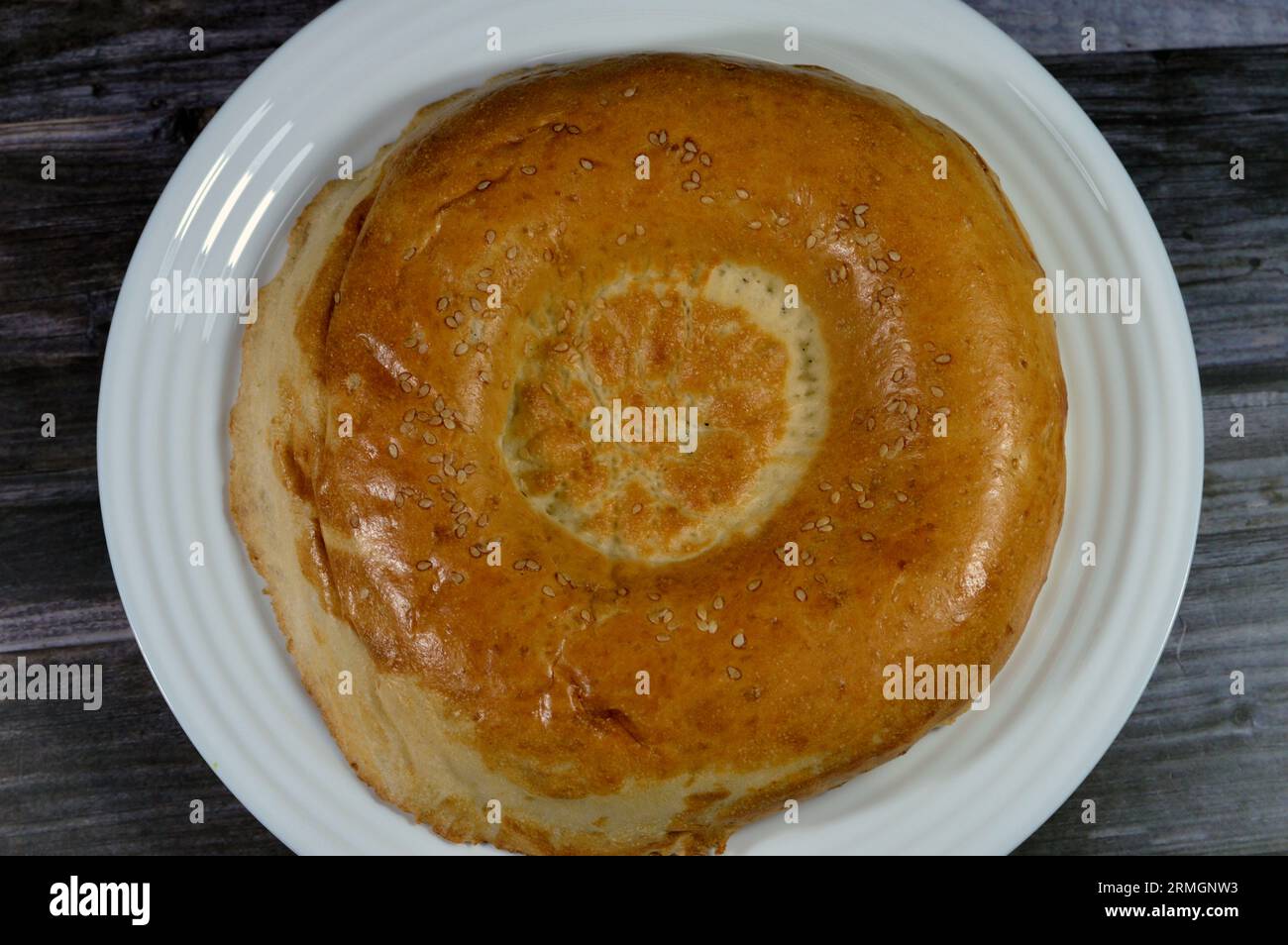 Tandyr nan Uzbek bread, a type of Central Asian bread, often decorated ...