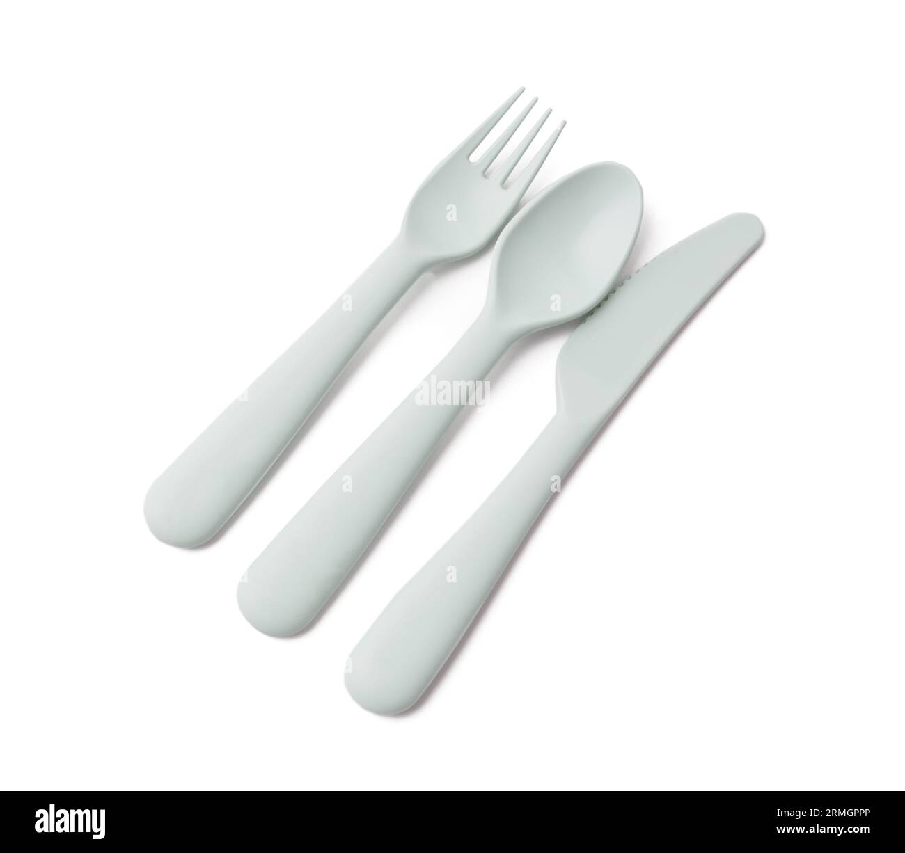 Plastic eating utensils for baby on white background Stock Photo - Alamy