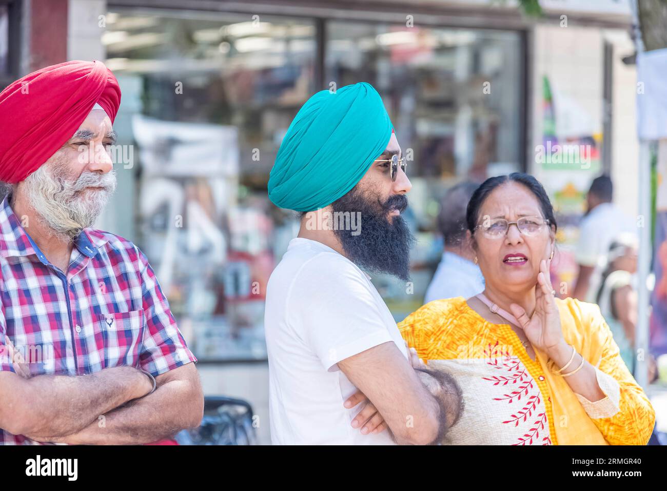 Toronto Ontario, Canada- July 30th, 2023: A family of Sikh’s hanging ...