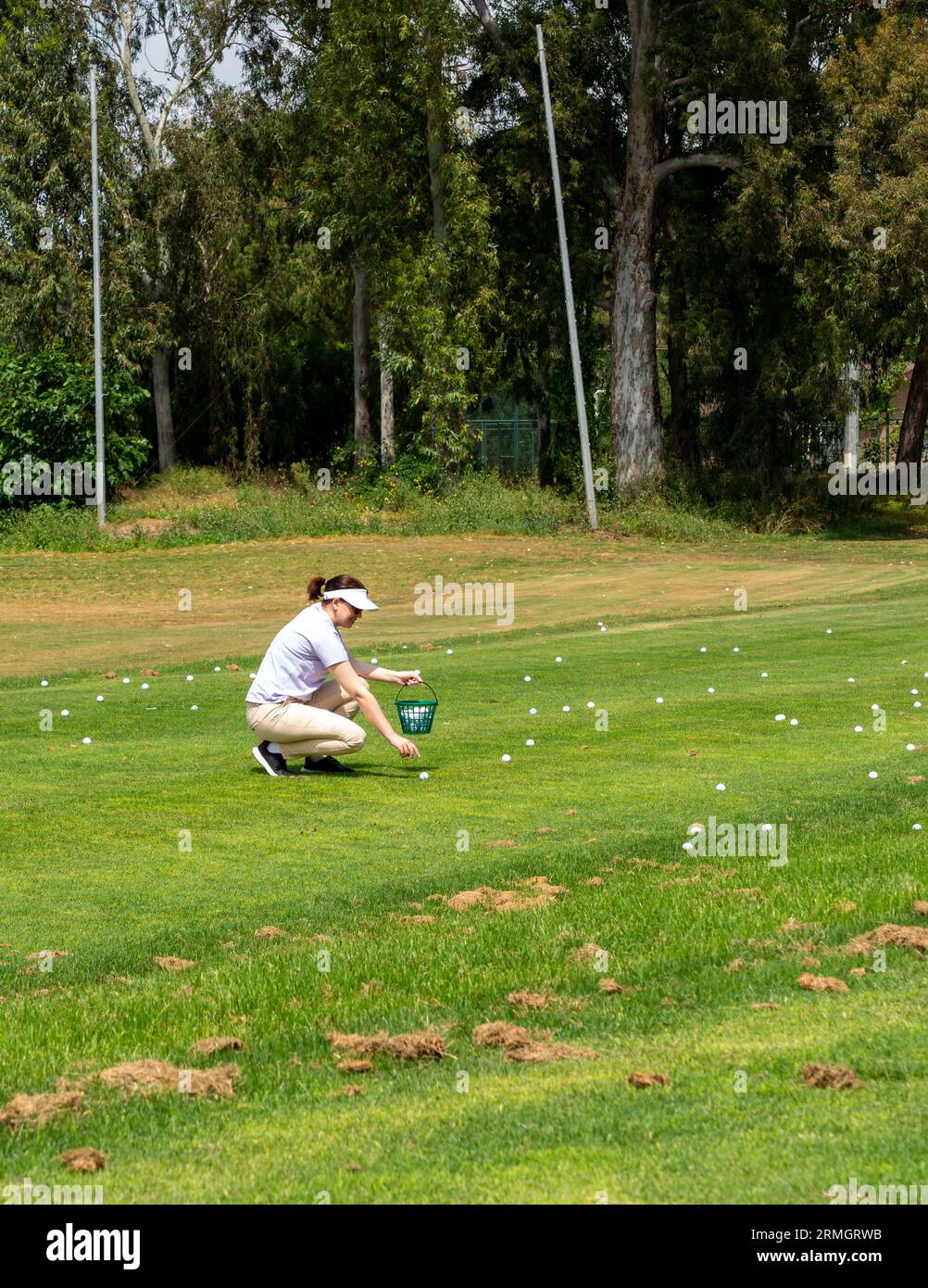 Female golfer driving range hi-res stock photography and images - Alamy