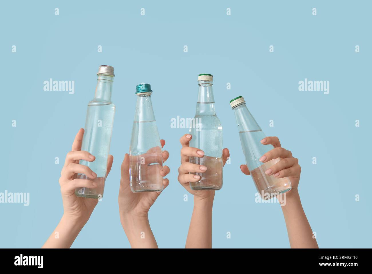 Female hands bottles cold hi-res stock photography and images - Alamy