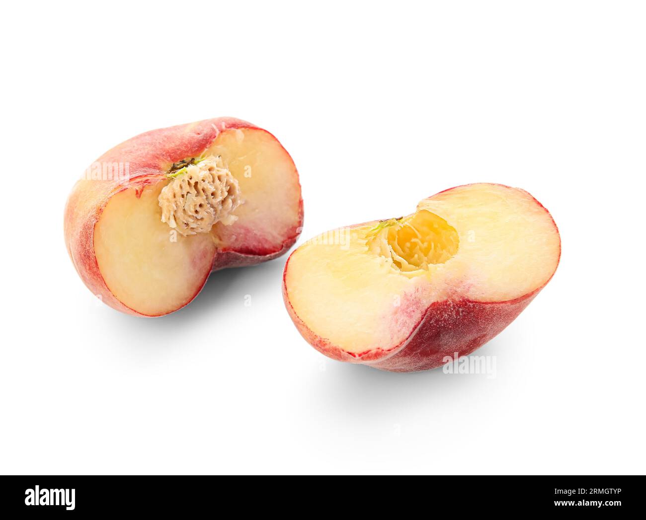 Halves of sweet fig peach on white background Stock Photo - Alamy